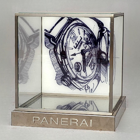 PANERAI. DISPLAY CASE WITH PORCELAIN PLATE ON THE BACK. METAL STRUCTURE ...