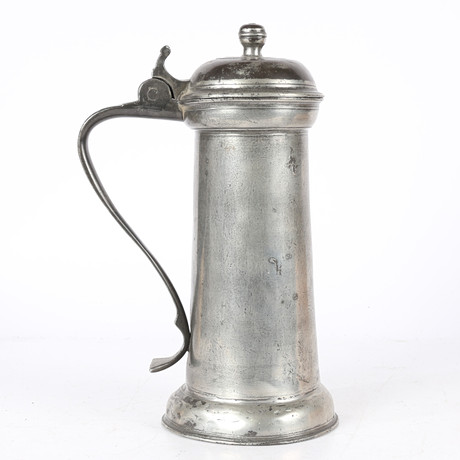 AN UNUSUAL CHARLES II FLAGON, IN THE JAMES I MANNER, CIRCA 1670. Silver ...