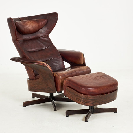 HELGE TARALDSEN. armchair with footstool, leather upholstery, wooden ...