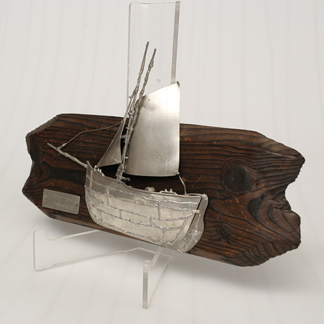 WALL RELIEF, in the form of a “half-model” of a smaller sailboat ...