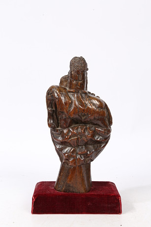 A RARE AND JOYOUS EARLY 15TH CENTURY OAK PEW-END FINIAL IN THE FORM OF ...