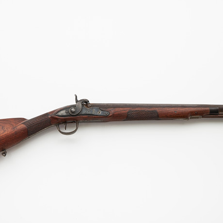 A FLINT LOCK RIFLE, for hunting, modified from flintlock, around the ...