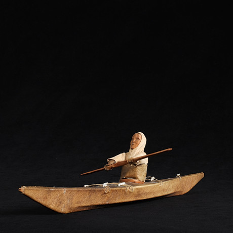 A leather, bone and wood kayak model, 20th century Inuit work ...