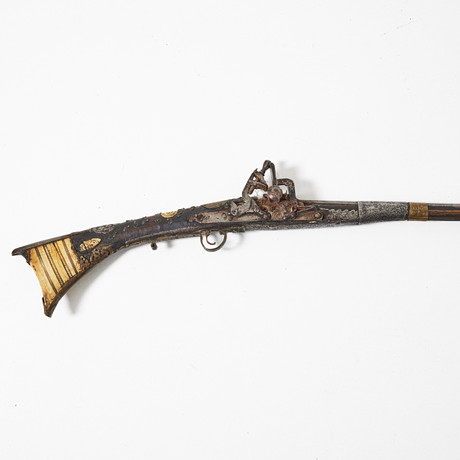 A flintlock flintlock rifle from Mouhkala, North Africa, 19th century ...