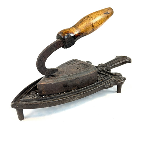 A cast iron and coasters, 18th/20th century. Miscellaneous ...