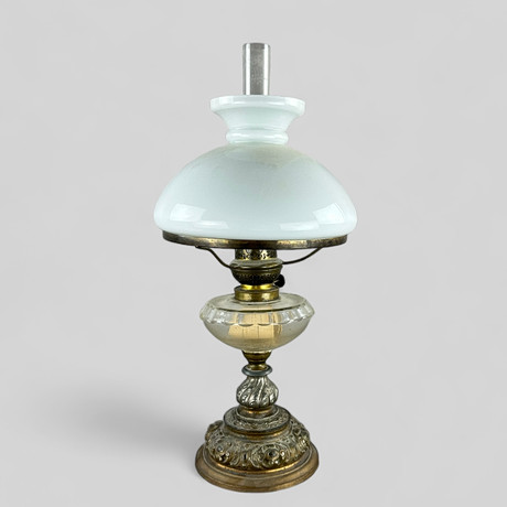A 20th-century table kerosene lamp, metal frame, glass container and ...