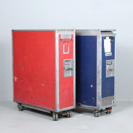 Two aluminum airplane trolleys, 'Primera Air' and 'Martin Air ...