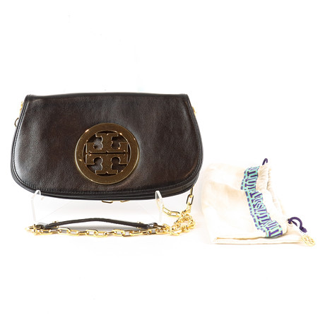 HANDVÄSKA Tony Burch, Logo Clutch. Vintagekläder & Accessoarer - Auctionet