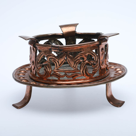 An 18th century Swedish lighthouse. Driven copper plate, acanthus loops ...