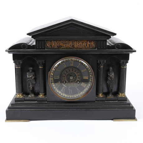 A LATE VICTORIAN BLACK SLATE MANTLE CLOCK OF ARCHITECTURAL FORM. Clocks ...