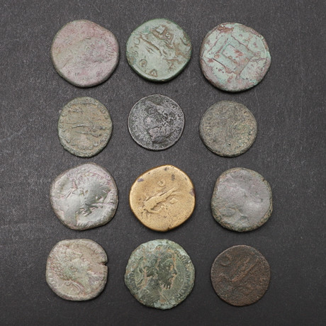 A COLLECTION OF TWELVE ROMAN COINS, LARGER DENOMINATIONS TO INCLUDE ...
