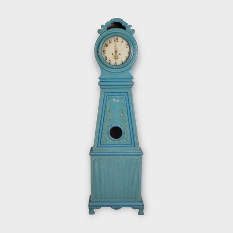 A carved and painted wooden floor clock, first half of the 19th century ...