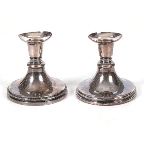 A pair of silver Löfman candlesticks, MGAB, 1973, gross weight 335 ...