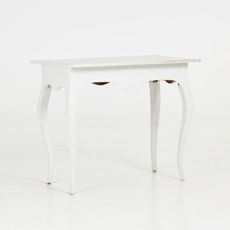 TABLE. Rococo, curved leg position, painted white, mounted disc ...