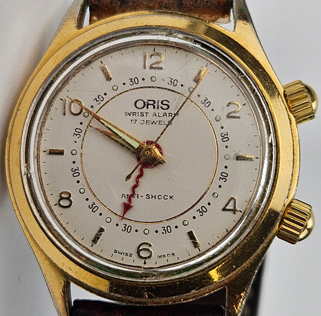 ORIS. Men's wristwatch, gold on steel, wrist alarm. Clocks & Watches - Wristwatches - Auctionet
