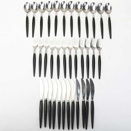 A set of 26 pieces, bakelite, stainless steel, 1950s. Miscellaneous ...