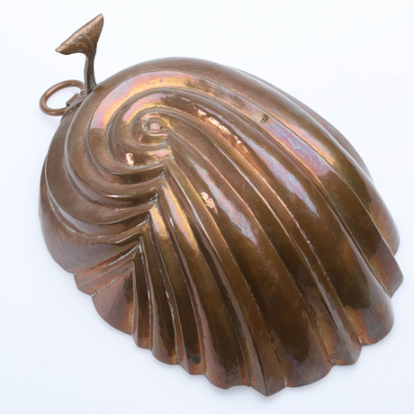 A copper “seashell” ALADOBE form, 18th century, with a heart mount ...