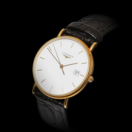 LONGINES, HERRARMBANDSUR, 18K GULD. Klockor & Ur - Armbandsur - Auctionet