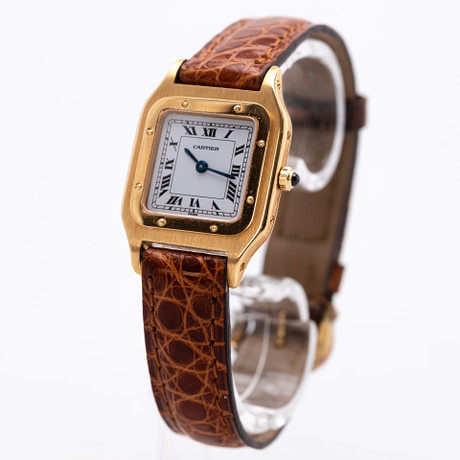 Cartier ”Santos Dumont Ultratunn”. Klockor & Ur - Armbandsur - Auctionet