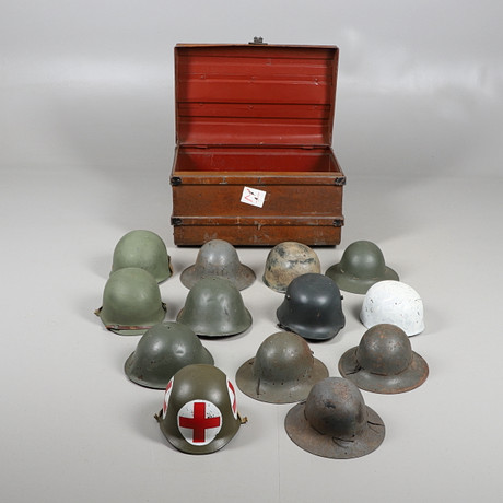 A COLLECTION OF UNIFORM AND CIVILIAN HELMETS. Weapons & Militaria ...