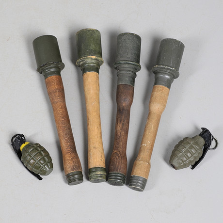 A COLLECTION OF AMERICAN AND GERMAN REPRODUCTION HAND GRENADES. Weapons ...