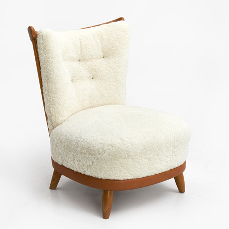 An armchair, upholstered in brown leather in sheep's wool, 1940s ...