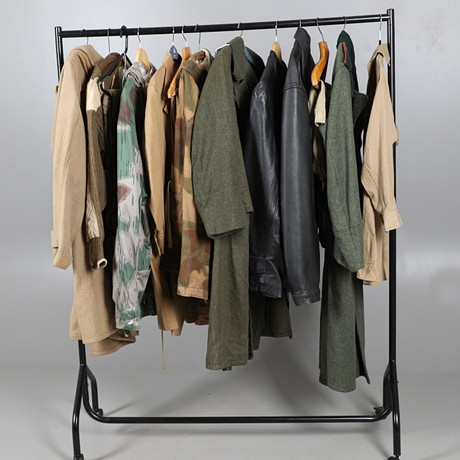 A MISCELLANEOUS COLLECTION OF MILITARY UNIFORM. Weapons & Militaria ...