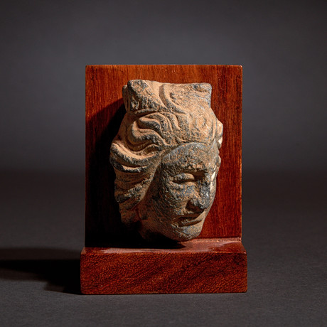 MAIN, Gandhara, ca 100-400 AD, slate, mounted on wooden plinth ...