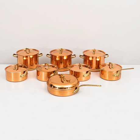 A set of 7 brass pots and tractor pans, brass details, Swedesign, end ...