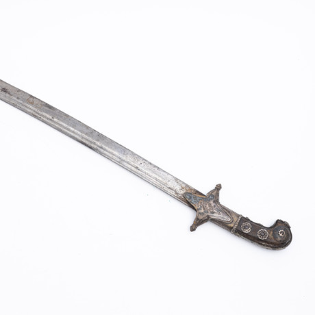 A Middle Eastern sable with silver fittings, 19th century. Weapons ...
