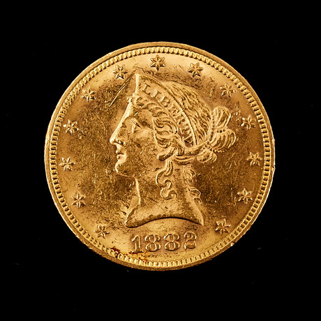 A gold coin, Statue of Liberty and eagle, 10 dollars, USA, 1882 ...