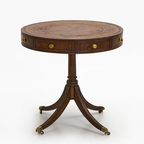 An English Regency carousel table, early 19th century, leather-clad ...