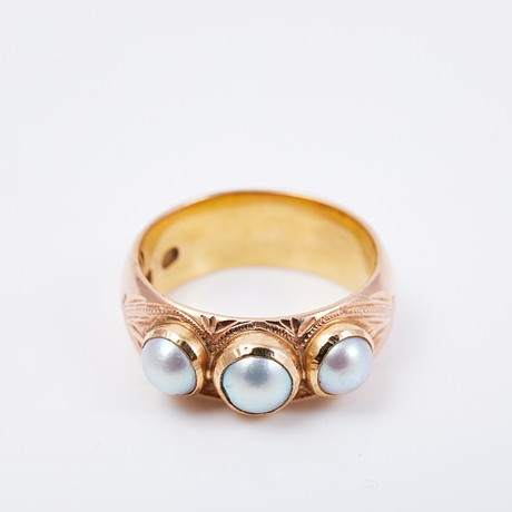 RING. 18k gold, early 20th century, 3 inset salt water pearls, engraved ...