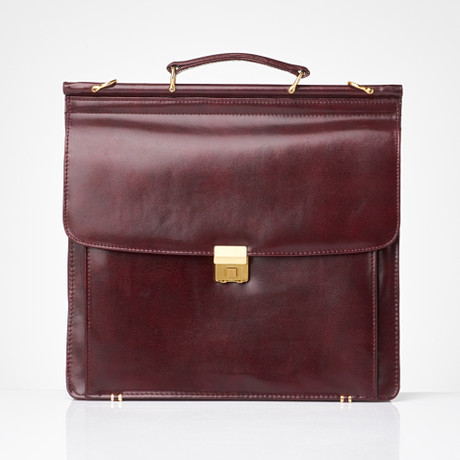 A leather briefcase, Baron, in the colour “Burgundy”, with shoulder ...