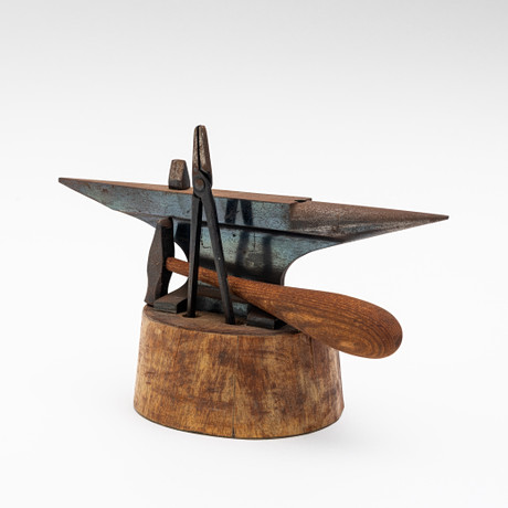 A miniature iron house with hammer and pliers, 20th century ...