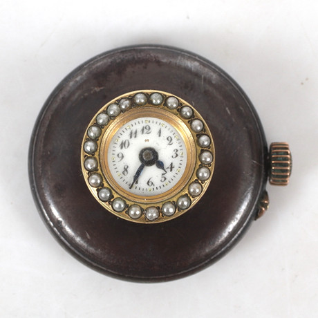 A manual, pantinated metal buttonhole clock, 20th century. Clocks ...