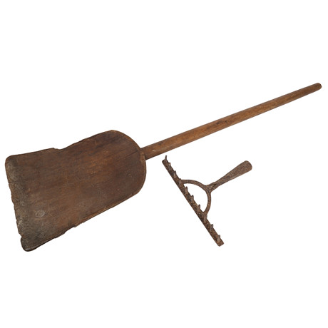 A 19TH CENTURY FRENCH MALT SHOVEL AND AN 18TH CENTURY ENGLISH WROUGHT ...