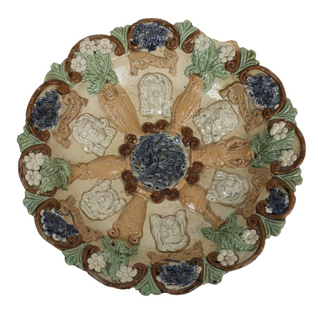 A 19TH CENTURY CASTLE HEDINGHAM POTTERY PLATE BY EDWARD BINGHAM ...