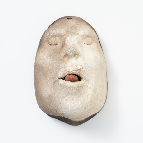 JOHAN THUNELL (1946). Sculpture in the form of a face, partially glazed ...