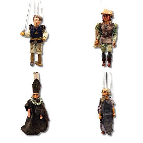 A COLLECTION OF HAND-CARVED PUPPETS FROM WOOD AND PLASTER IN THE MID ...