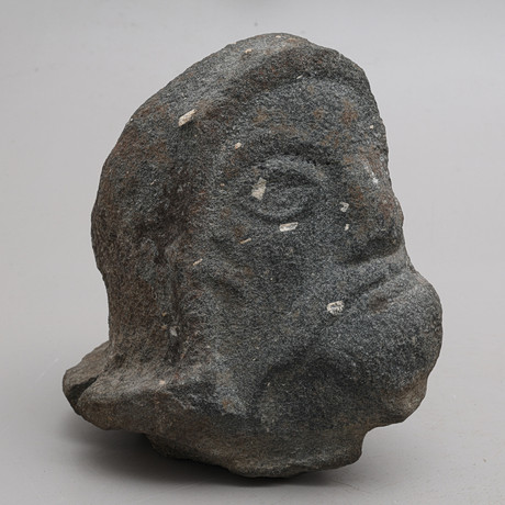 A ROMANESQUE STONE SCULPTURE OF A MAN'S HEAD, FRANCE, AUVERGNE, 12TH ...