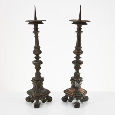 A pair of 18th century baroque altar candlesticks, bronze. Lighting ...