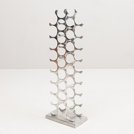 MICHAEL NOLL. A 21st-century Eichholtz aluminium floor wine rack ...