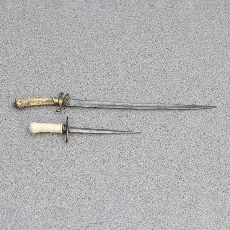 STICK GUNS, TWO PCS. Hirschfänger, among others. 18th/20th century ...