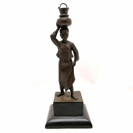 BURMESE PEGU BRONZE FIGURE OF A LADY IN DRESS CARRYING WATER BUCKET AND ...