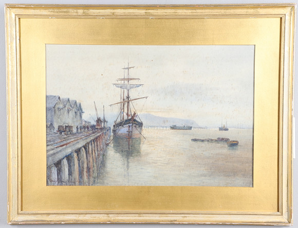 CLAUDE ROWBOTHAM (1864-1949). A SAILING SHIP MOORED AT A WATERFRONT ...