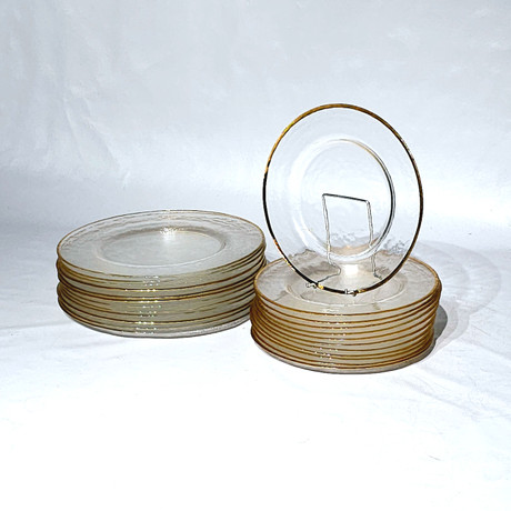Set of twelve respect plates and twelve flat plates in glass with gold ...