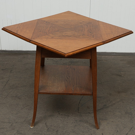 An oak ENVELOPE TABLE, first half of the 20th century. Furniture ...