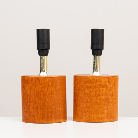 A pair of wooden and metal table lamps, labelled Markslöjd, second half ...