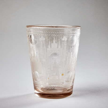 A Bohemian beaker, 18th century, engraved decoration of houses in ...